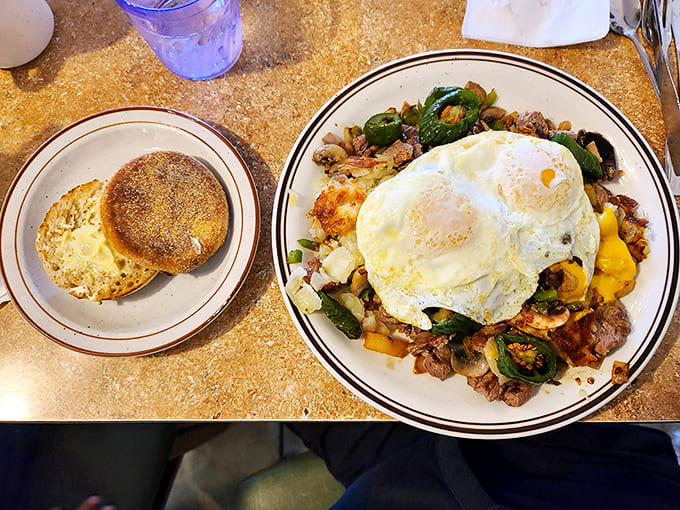 Breakfast perfection on a plate – eggs cooked just right, crispy hash browns, and a hearty portion that'll fuel your entire day.