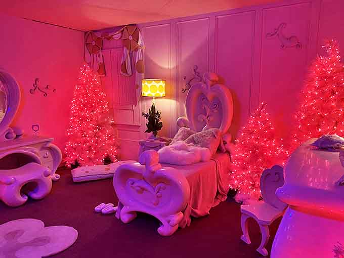 Pink Christmas trees and fantasy furniture create a bedroom that would make Barbie jealous and Ken question his decorating skills.