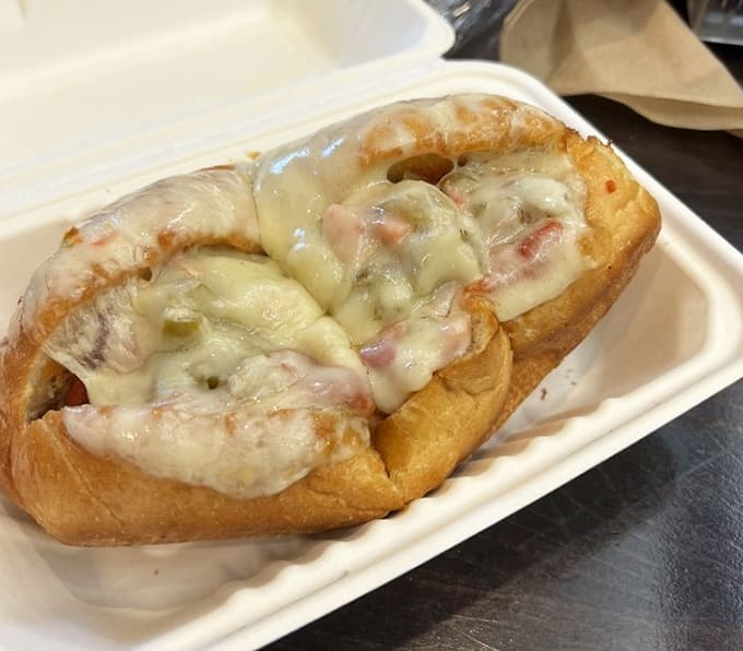 That Italian sausage on crusty bread with melted cheese proves sometimes the simplest combinations create the most memorable flavors.