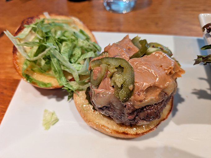 This isn't just a burger &ndash; it's a revelation. The perfectly cooked patty topped with fresh greens makes every calorie worth the indulgence.