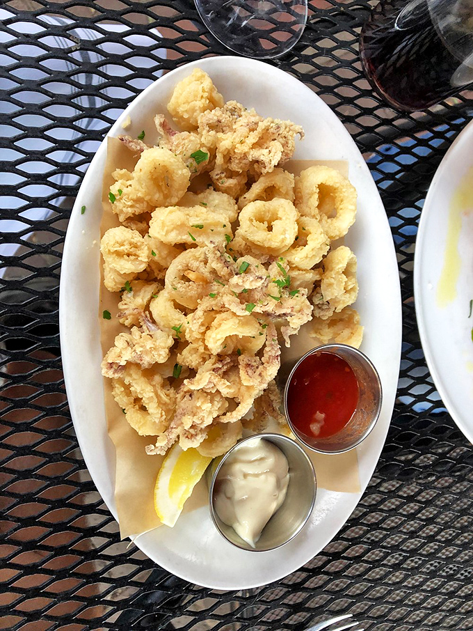 Calamari: Golden, crispy perfection with two dipping sauces that'll make you wonder why you ever settled for lesser calamari. Life's too short!