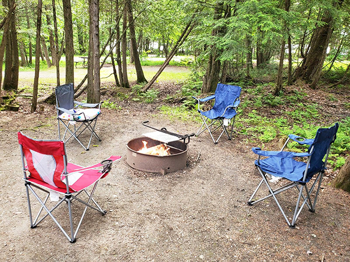 Campfire conversations and marshmallow debates – the universal language spoken around Lake Carmi's fire rings as twilight falls.