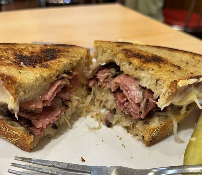 The Russian Reuben on caraway rye is a towering testament to the art of sandwich-making and pure indulgence.