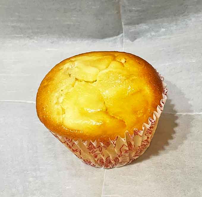Golden-topped and impossibly moist, this cheesecake muffin delivers a one-two punch of tender crumb and creamy filling that defies physics.