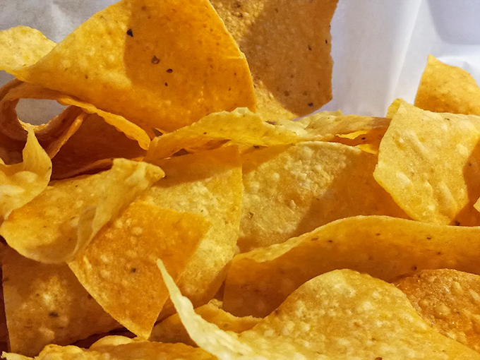 Behold, the golden treasures of Casa Palomino! These chips are so fresh and crispy they could make a potato feel insecure about its place in the snack world.