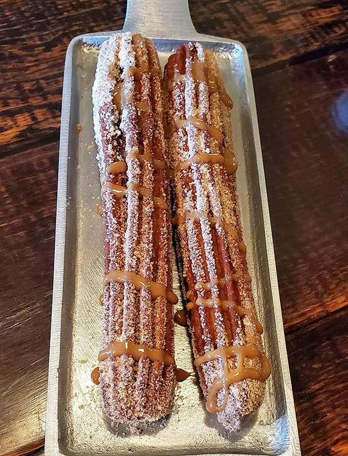 Churros: Golden, ridged perfection dusted with cinnamon-sugar and drizzled with caramel&mdash;these churros might make you weep with joy.