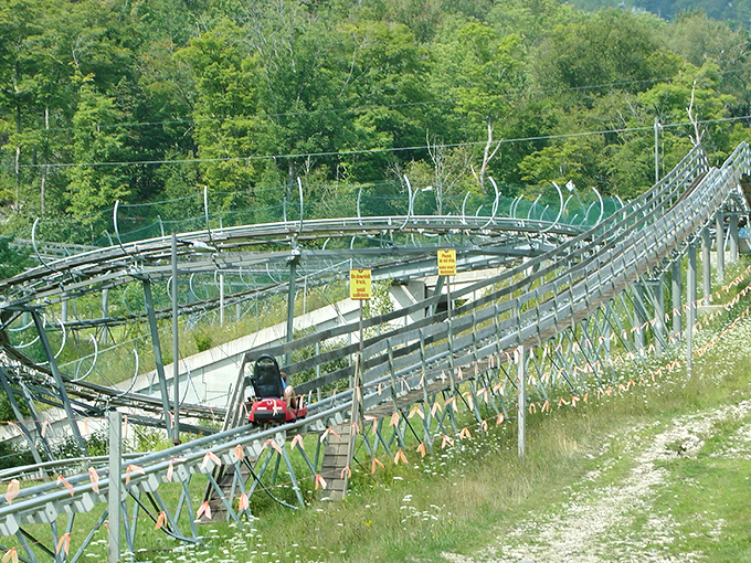 Engineering meets nature as the track winds through the landscape, following the mountain's contours like a silver ribbon.