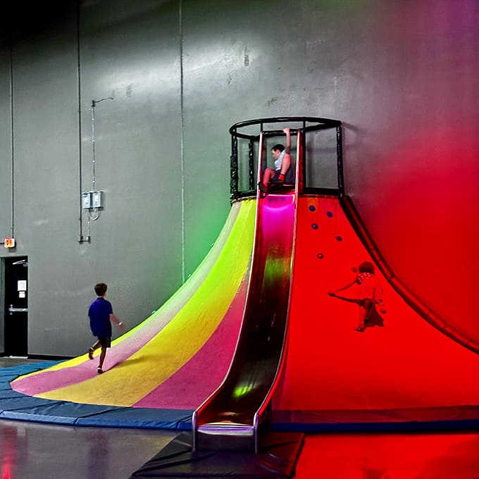 This rainbow volcano slide delivers equal parts thrill and nostalgia, proving some childhood joys never get old, just more colorful.
