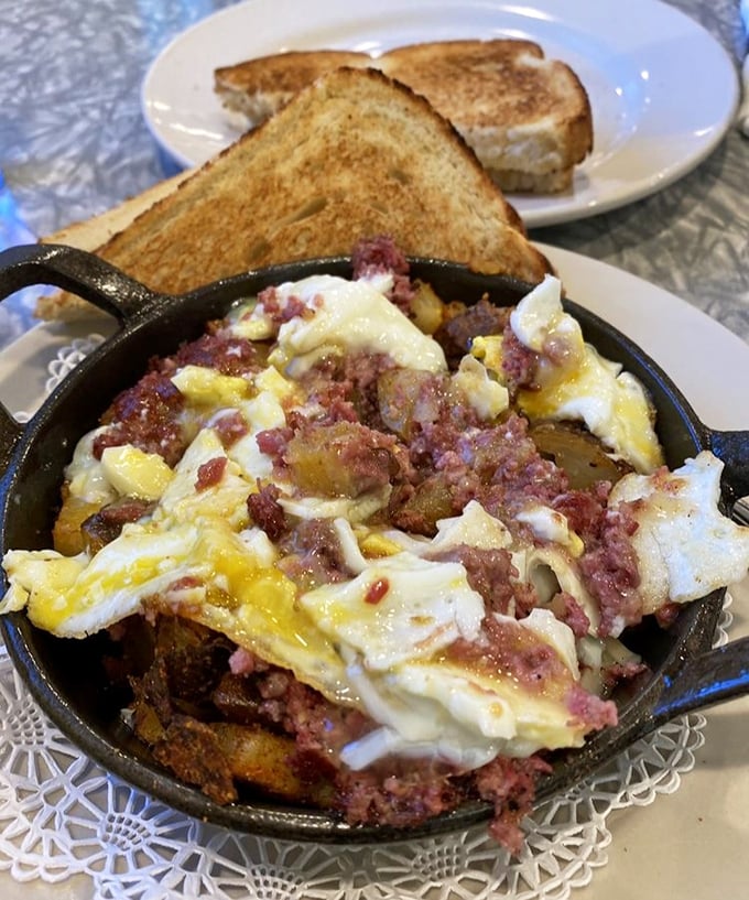 The legendary corned beef hash &ndash; chunky, house-made corned beef mingles with crispy potatoes under perfectly cooked eggs. This isn't just breakfast; it's a religious experience.