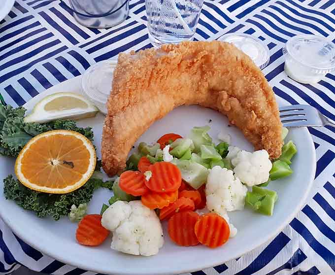 Golden, crispy, and perfectly cooked walleye that could make a pescatarian out of the staunchest landlubber at your table.