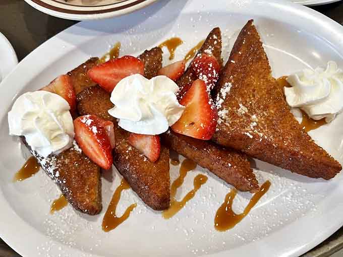 Deep Fried French Toast: Golden triangles of breakfast perfection, where each bite delivers a crispy exterior giving way to custardy bliss.