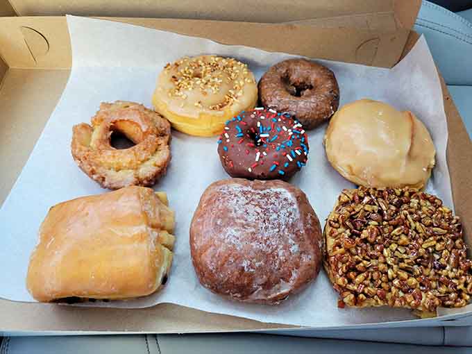 A baker's dozen of pure joy, each doughnut bringing its own personality to this delicious family reunion.