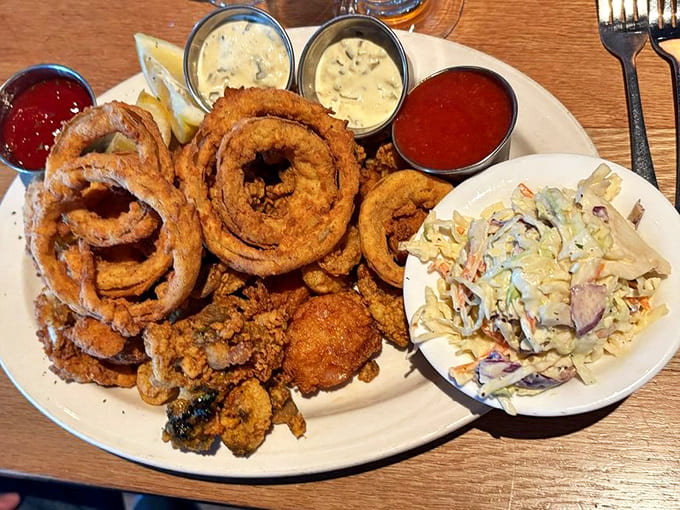 The Fried Fisherman's Platter arrives like a golden treasure chest, proving that everything really does taste better when properly fried.
