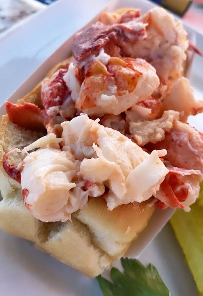 Behold the lobster roll in all its glory: generous chunks of sweet meat, lightly dressed, piled high on a toasted bun.