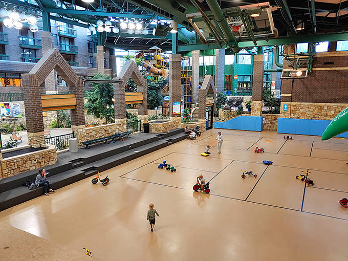 The spacious play area combines climbing structures with open spaces, giving energetic kids room to run while parents enjoy actual sitting time.