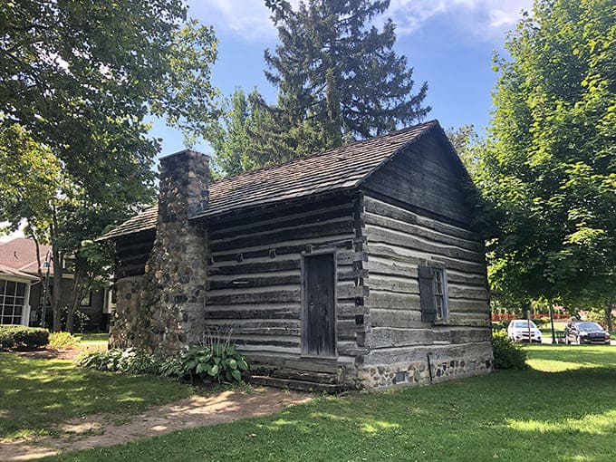 This humble log cabin offers a striking contrast to Curwood's fanciful castle, showing how far Michigan had come from pioneer days to literary fame.
