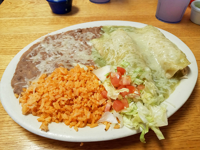 Behold the star of the show &ndash; corn tortillas embracing their fillings like a warm hug, all bathed in sauce that's been perfected over generations.