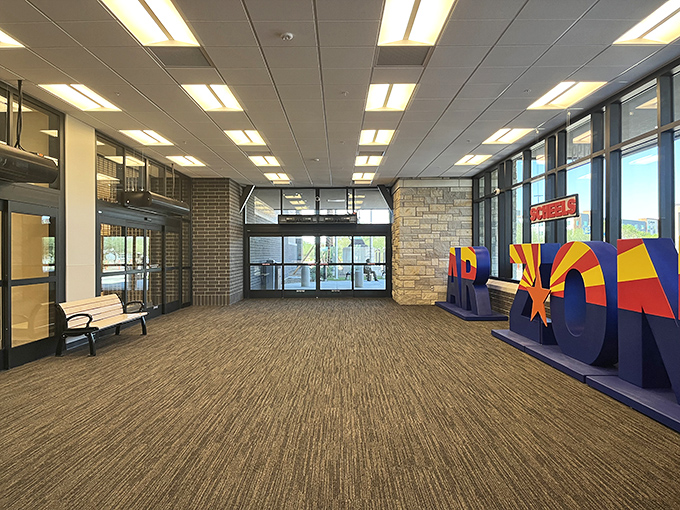 Arizona pride shines through in the welcoming lobby, where the transition from desert heat to retail paradise begins with a colorful flourish.
