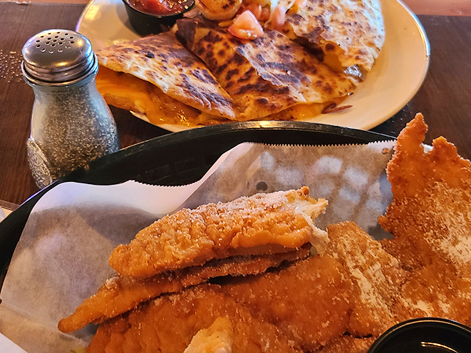 Golden, crispy perfection &ndash; the fish and chips arrive with that magical crunch that makes time stand still and problems disappear with each heavenly bite.