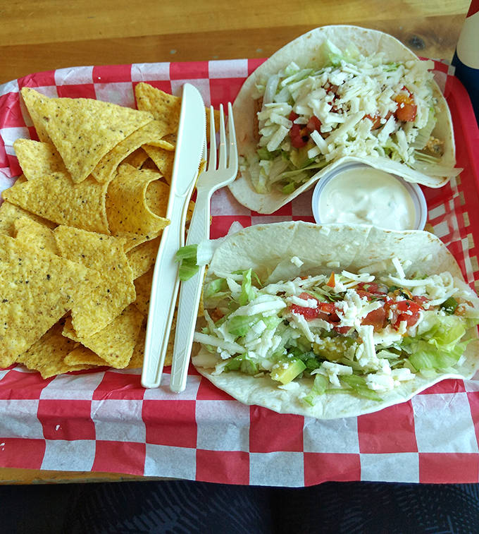 These aren't just any fish tacos &ndash; they're a perfect harmony of crispy whitefish, fresh toppings, and house-made sauce served with golden tortilla chips.