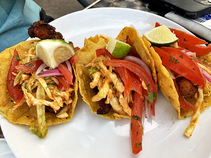 These aren't just fish tacos &ndash; they're edible poetry. Crispy tilapia, vibrant slaw, and zesty sauce create perfect harmony in every bite.