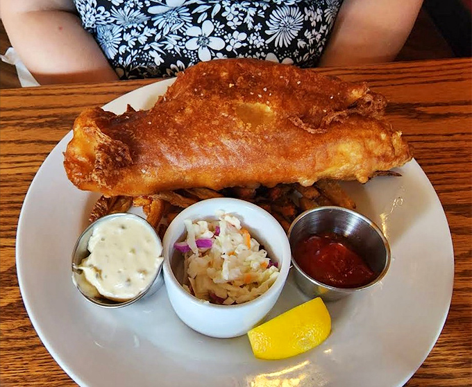 Golden-battered haddock that shatters at first bite, paired with hand-cut fries and house-made slaw &ndash; fish and chips nirvana achieved.