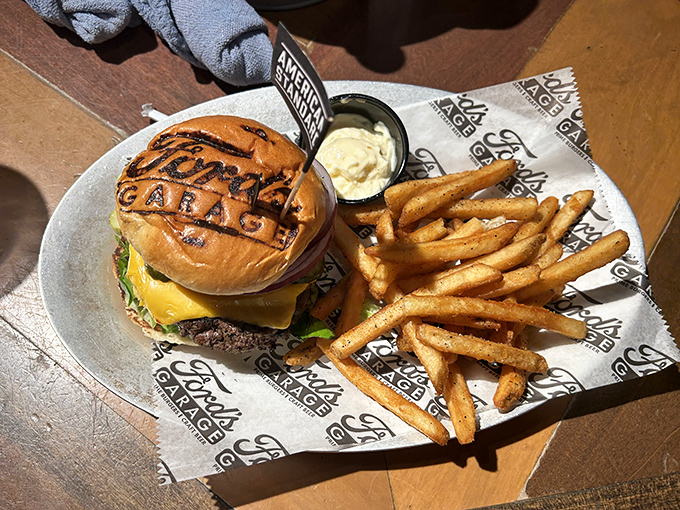 Behold the signature burger &ndash; flame-grilled perfection branded with the Ford logo, because even your food gets the VIP treatment here.