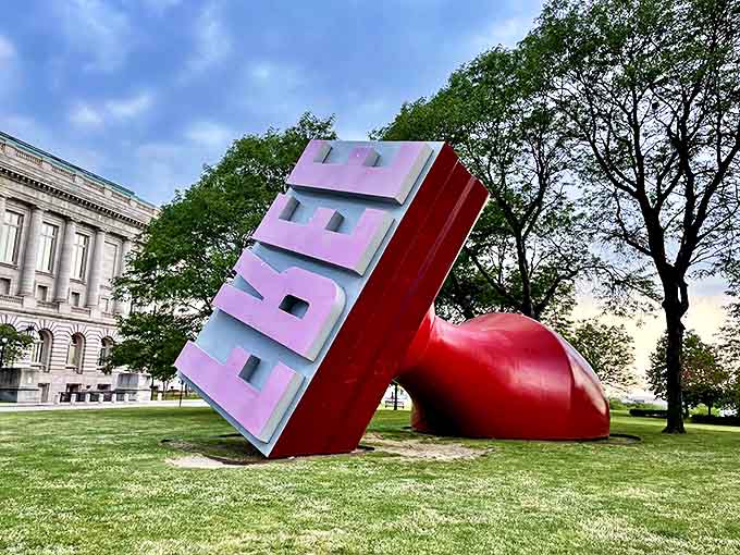 From this angle, the Free Stamp's massive scale becomes apparent &ndash; those aren't toy people, folks, that's just one seriously oversized office supply!