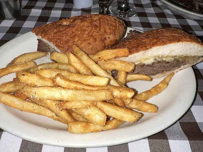 Behold the French dip in all its glory, golden bread cradling tender beef like precious cargo.