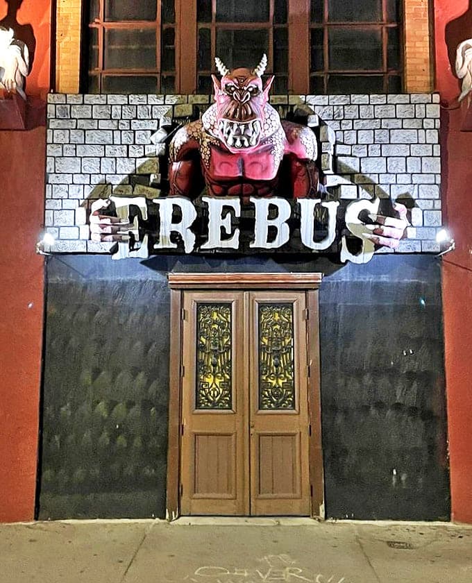 Front door: The entrance to Erebus features a massive demon bursting through stone walls – subtlety is not in their vocabulary.
