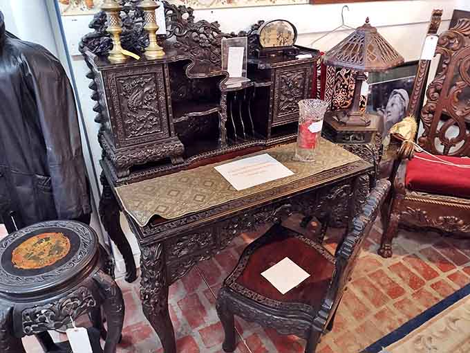 This intricately carved wooden desk whispers stories of important letters written, business conducted, and life decisions made across generations.