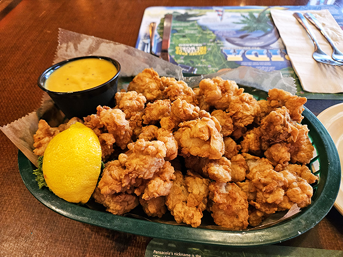 Golden-brown morsels of Florida heritage, these tender gator bites with tangy dipping sauce convert skeptics into believers with just one crunch.