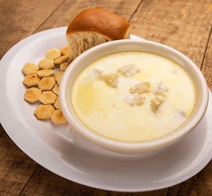 This bowl of haddock chowder looks like liquid gold, and honestly, that's not far from the truth in terms of value.