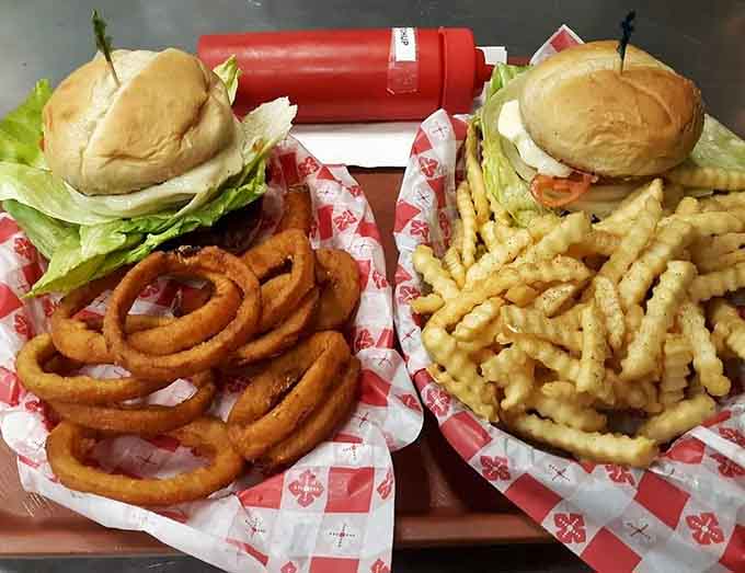 These burgers come loaded with all the fixings, flanked by crispy onion rings and fries that'll make you forget your diet ever existed.