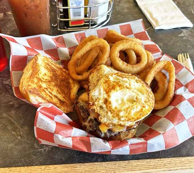 That burger and those onion rings represent the platonic ideal of casual dining, golden and glorious and completely unapologetic about calories.