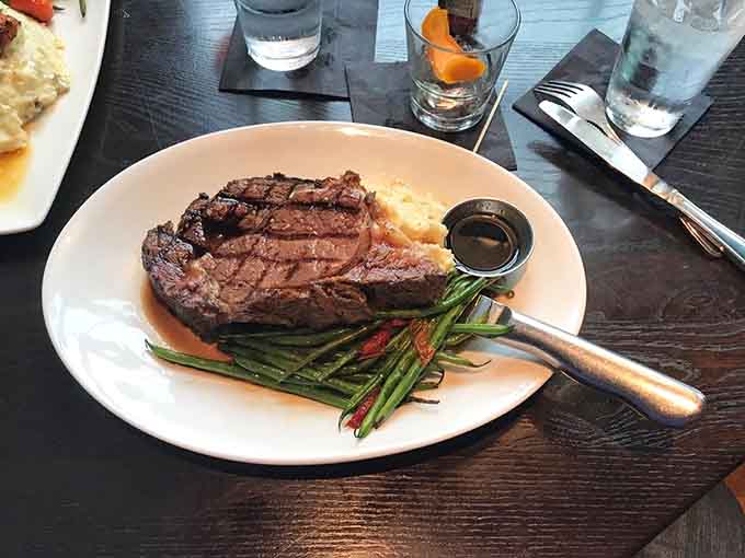 Behold the prime rib in all its glory, perfectly cooked and ready to make all other steaks jealous.