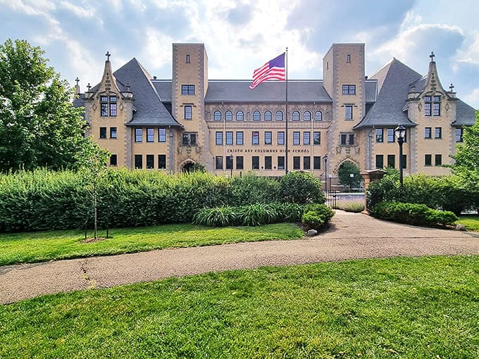 Standing sentinel beyond the garden, this historic building provides a stately backdrop to the living artwork below.