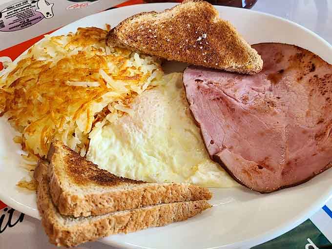 Ham, eggs, hash browns, and toast form the breakfast quartet that's been harmonizing on plates here for decades.