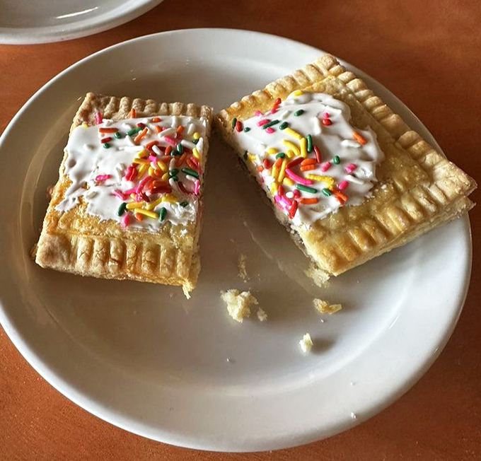 These aren't your childhood Pop Tarts! Flaky pastry, sweet icing, and playful sprinkles transform this nostalgic treat into gourmet territory.