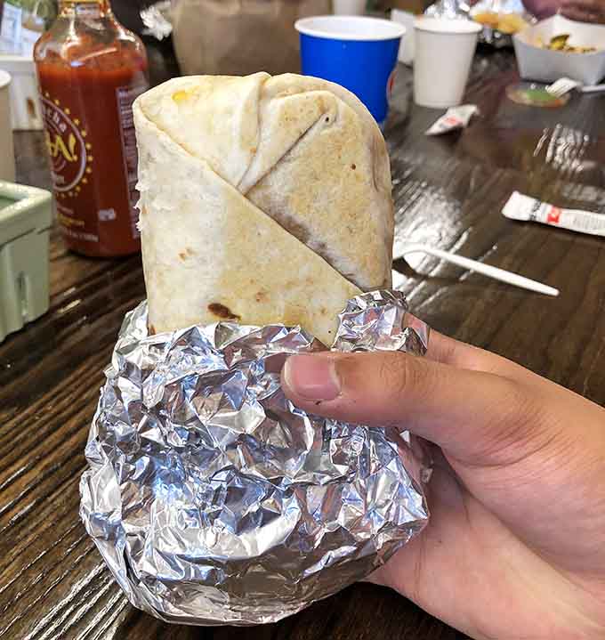 Behold the fish burrito that's converting skeptics and delighting believers, wrapped up and ready to change your life one bite at a time.