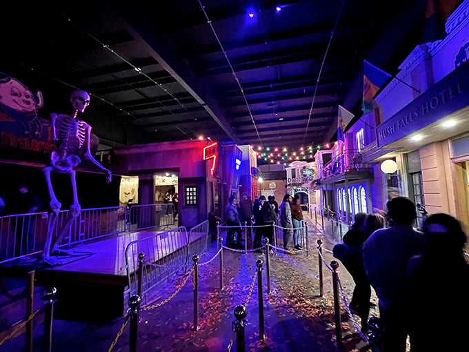 The anticipation builds as visitors line up, unaware of the secret bars hiding just beyond these haunted corridors.