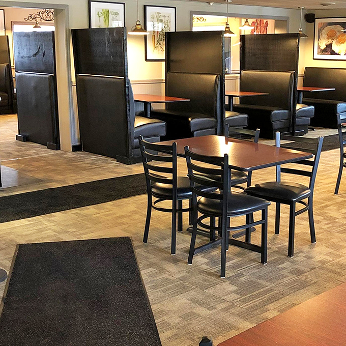 Cozy booths and warm lighting set the stage for comfort food magic. It's like your grandma's kitchen, minus the plastic-covered furniture.