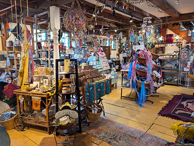 Step into organized chaos! The interior bursts with handcrafted treasures from floor to ceiling—each shelf a new adventure waiting to be discovered.