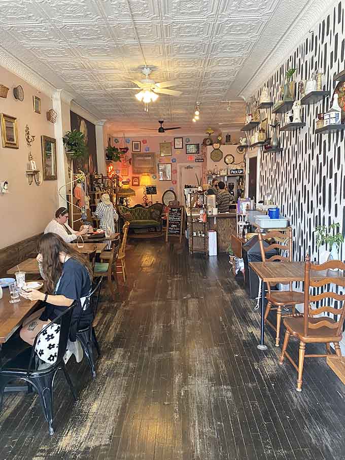 The eclectic interior mixes vintage charm with modern comfort, creating a space where every corner tells a different story worth discovering.