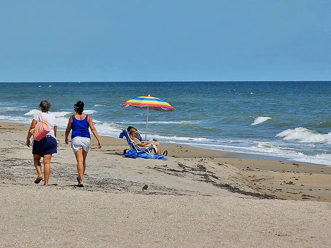 Beach therapy in session as strollers enjoy the shoreline &ndash; no appointment necessary, just bring your troubles and watch them dissolve.
