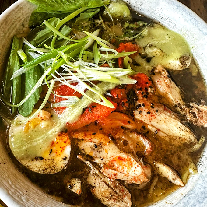 This vibrant bowl balances tender chicken, fresh vegetables, and a broth so complex you'll want to drink every last drop.