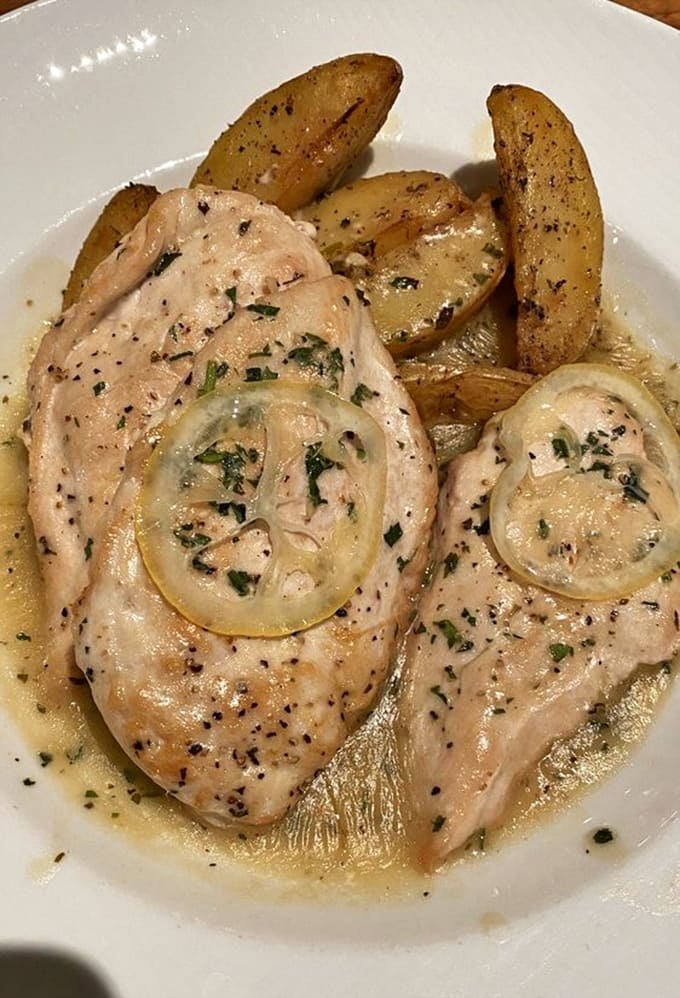 Leone's Lemon Chicken arrives looking like it just stepped off a magazine cover, ready for its close-up.