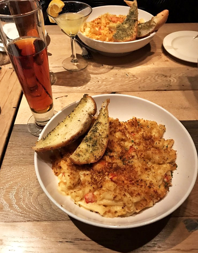 A bowl of golden perfection &ndash; DiMillo's famous Lobster Mac & Cheese arrives with a perfectly crispy top hiding chunks of sweet Maine lobster beneath.