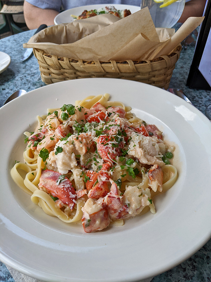 Maine meets Mediterranean in this lobster pasta masterpiece – chunks of sweet lobster nestled among perfectly cooked fettuccine in a creamy sauce.