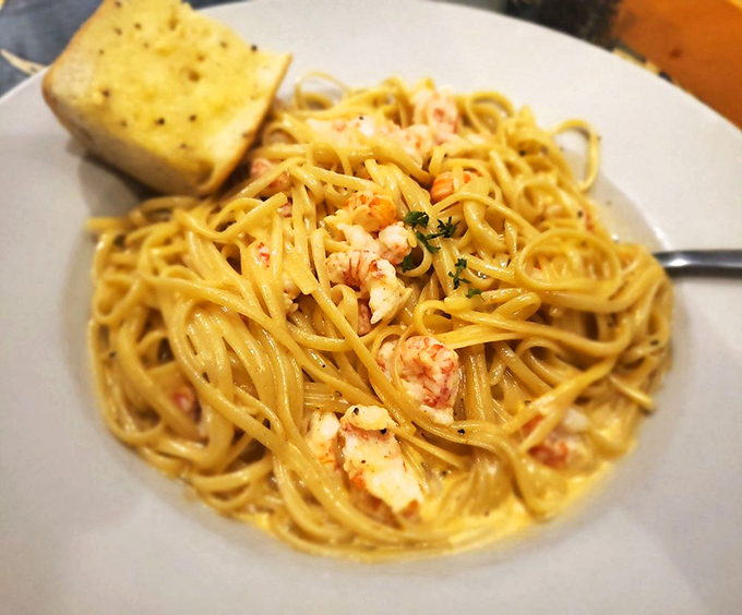 Tender linguine embraces sweet lobster morsels in a creamy sauce that somehow manages to be decadent without overwhelming the star ingredient.